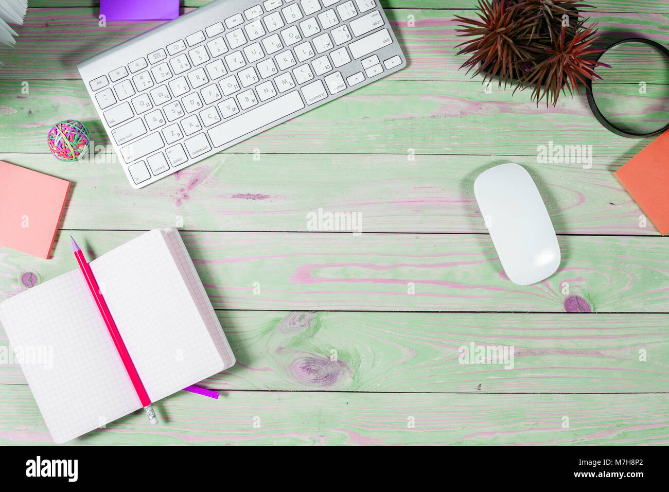 Modern green wooden office desk with laptop computer Stock Photo - Alamy