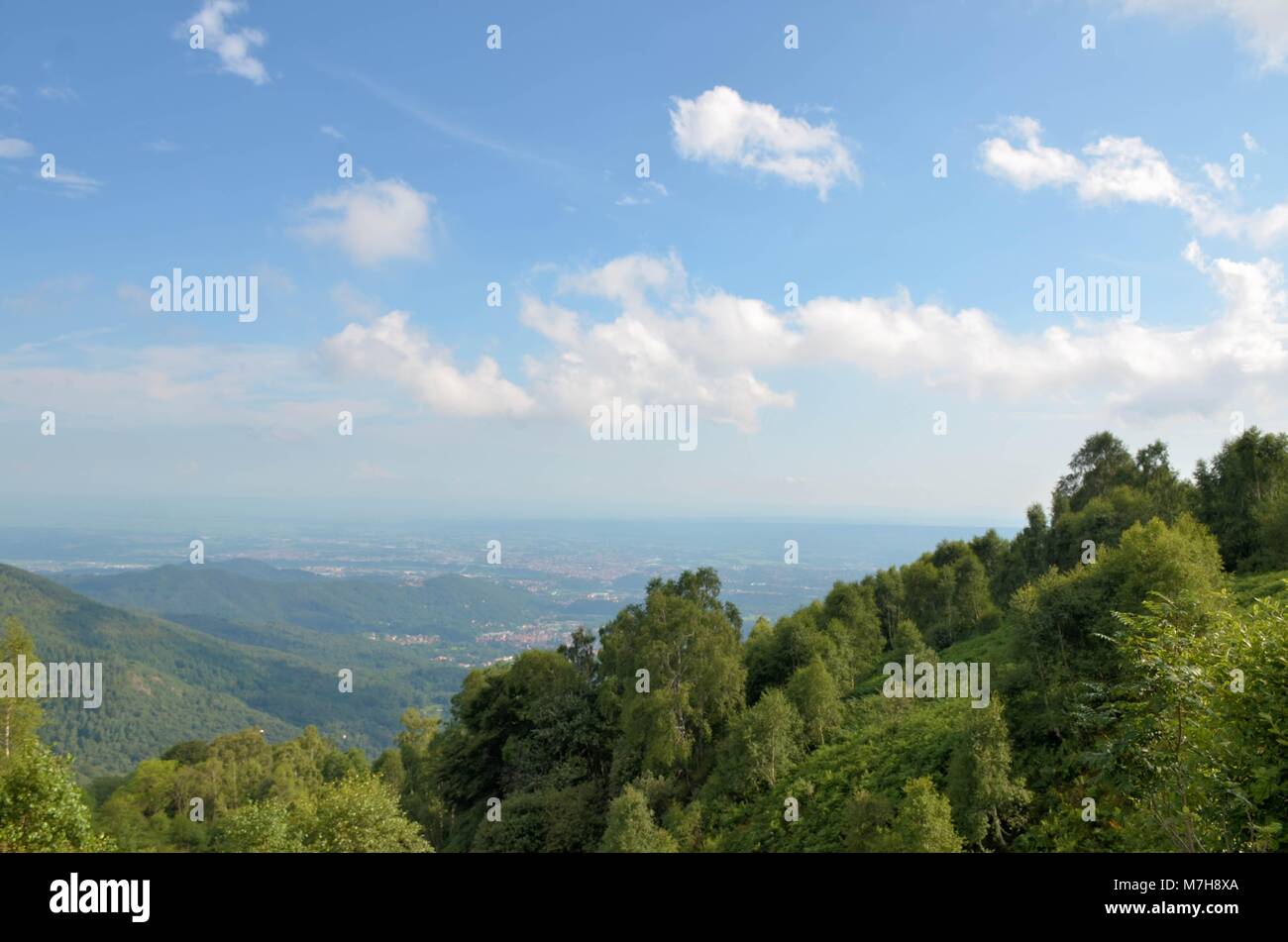 Amazing mountain view landscape on a sunny day, with clouds moving, sun ...