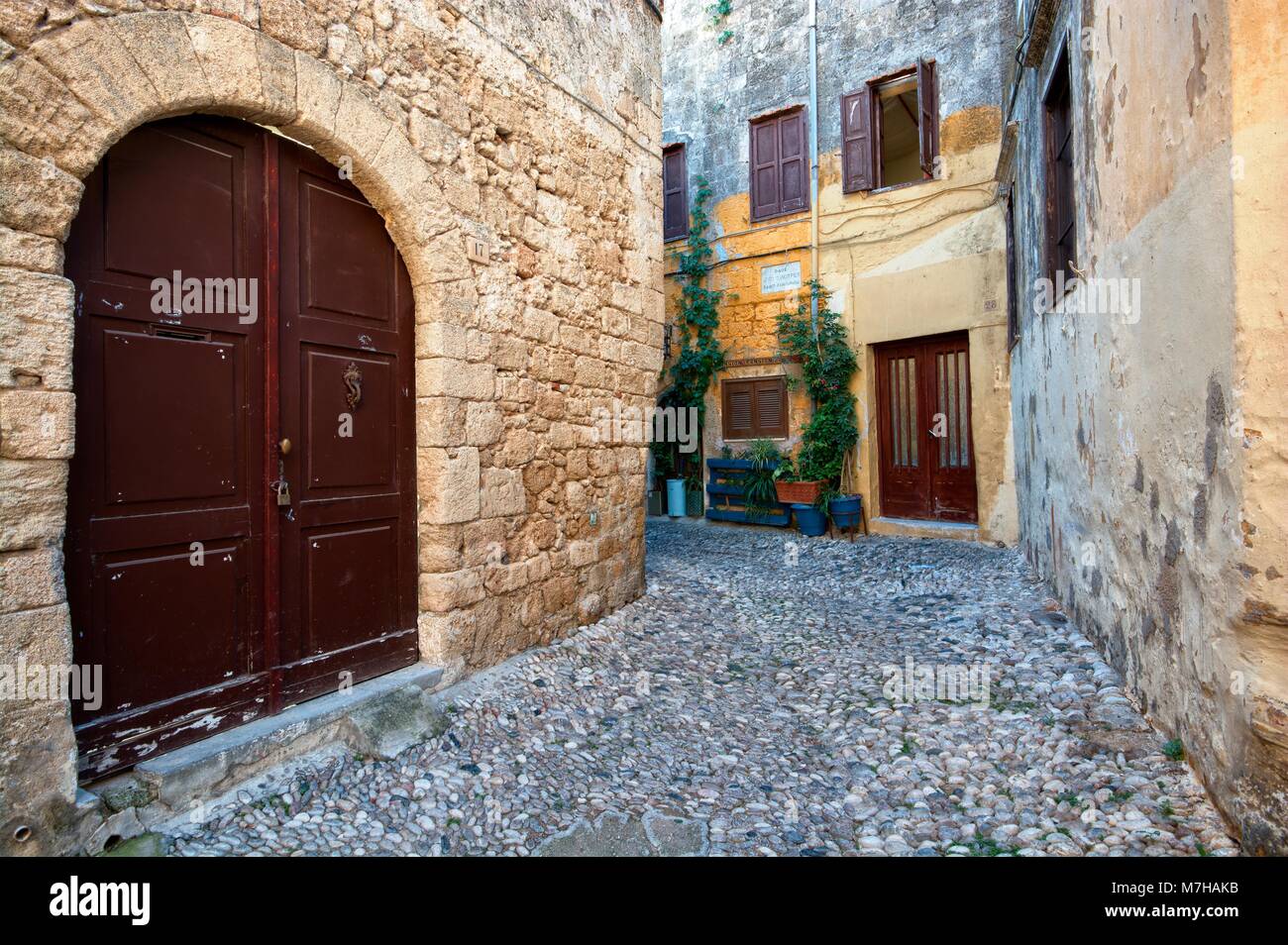Narrow street of medieval Old Town of Rhodes - UNESCO World Heritage ...