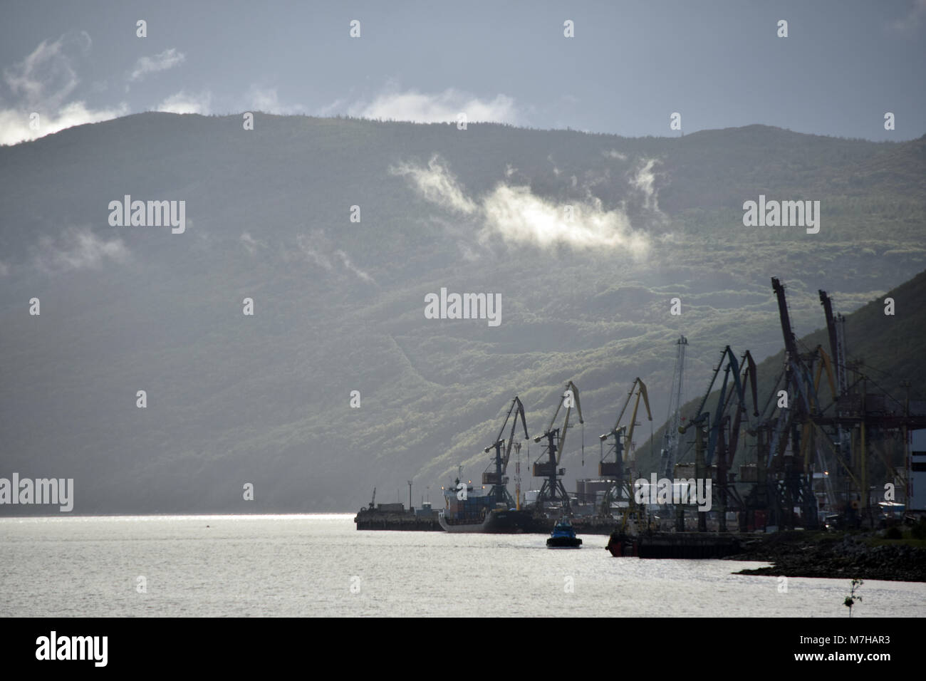 The harbour of Magadan in the Nagaievo Bay on the Okhotsk sea Stock ...