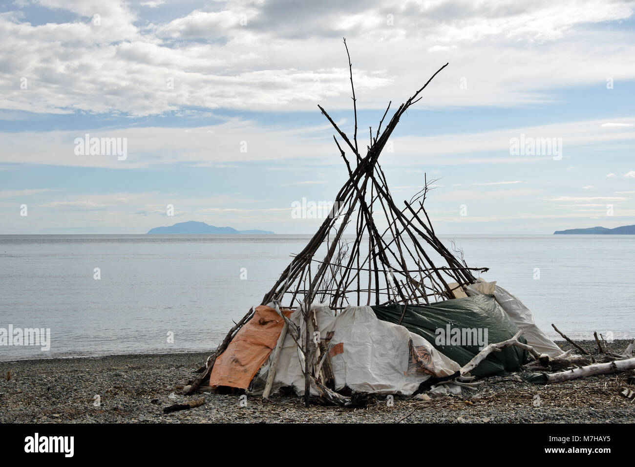 Remains of a camp on the beach of Ola on the Okhotsk sea. In the ...