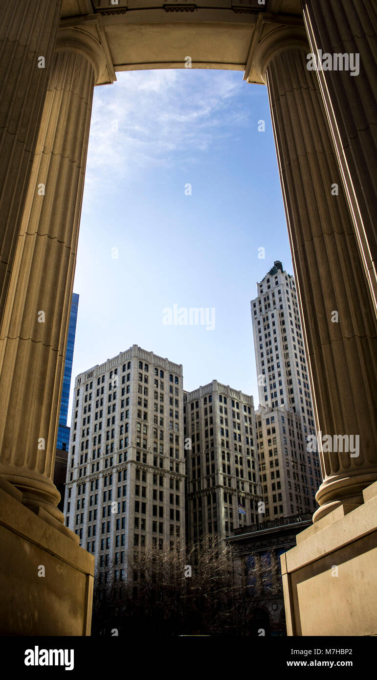 Taken in Chicago these pillars are framing the buildings behind them ...