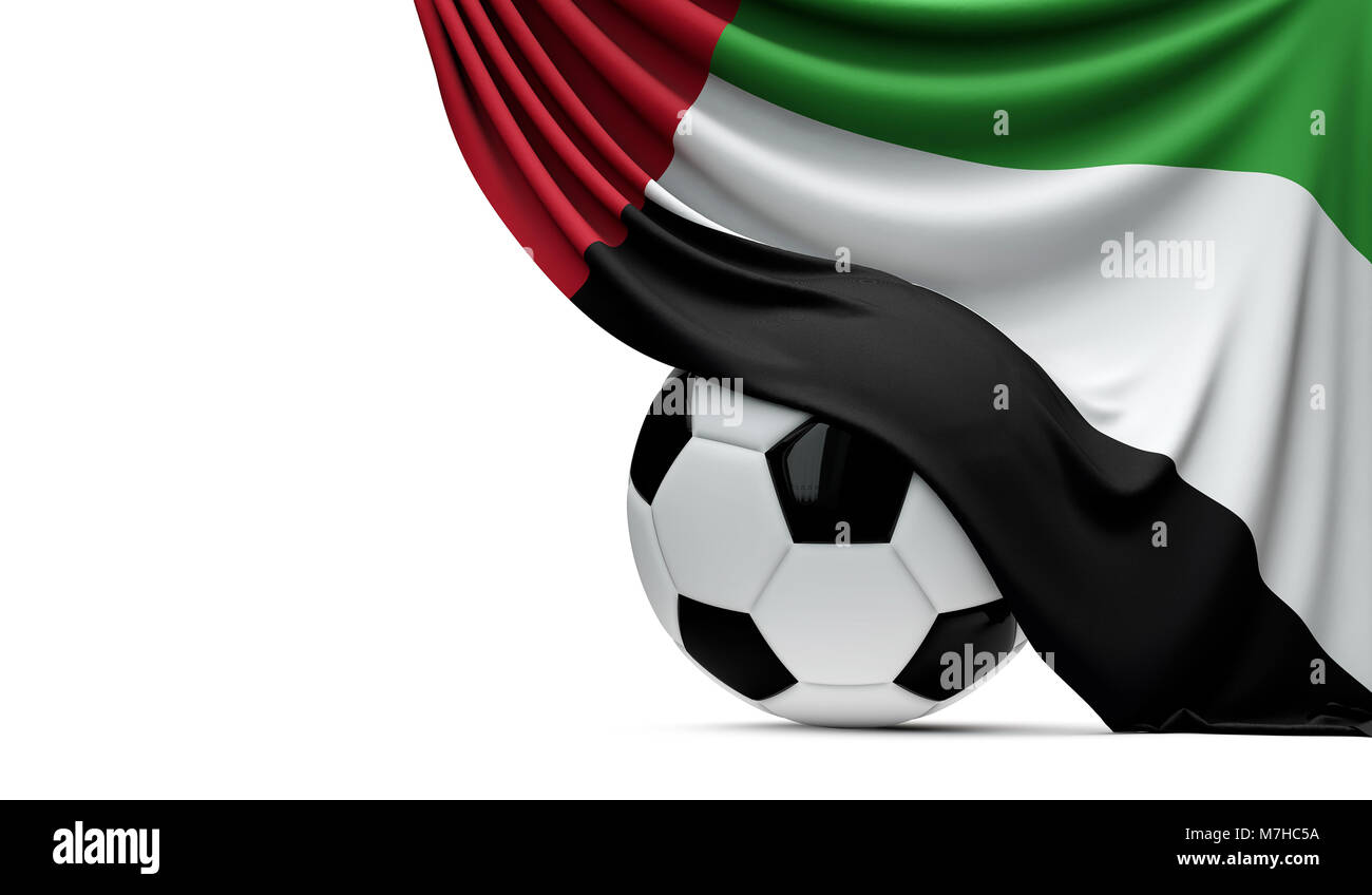 United Arab Emirates national flag draped over a soccer football ball ...
