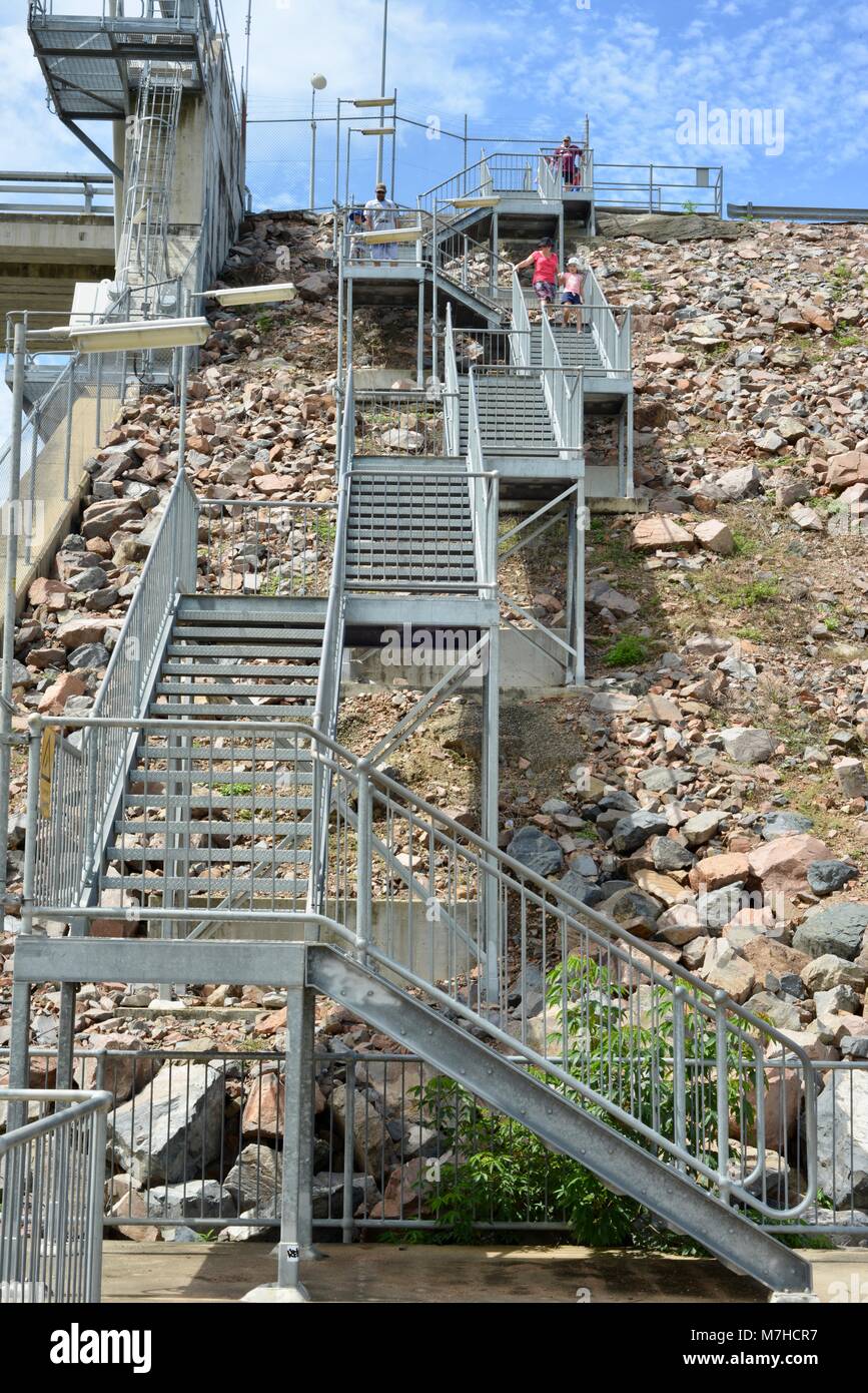 Children and adults walking down galvanised steel stairs, Ross River ...