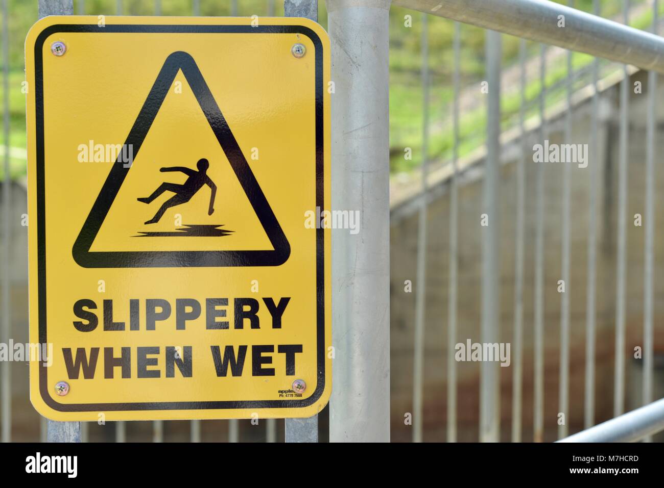 slippery when wet sign with image of man falling over, Ross River Dam ...