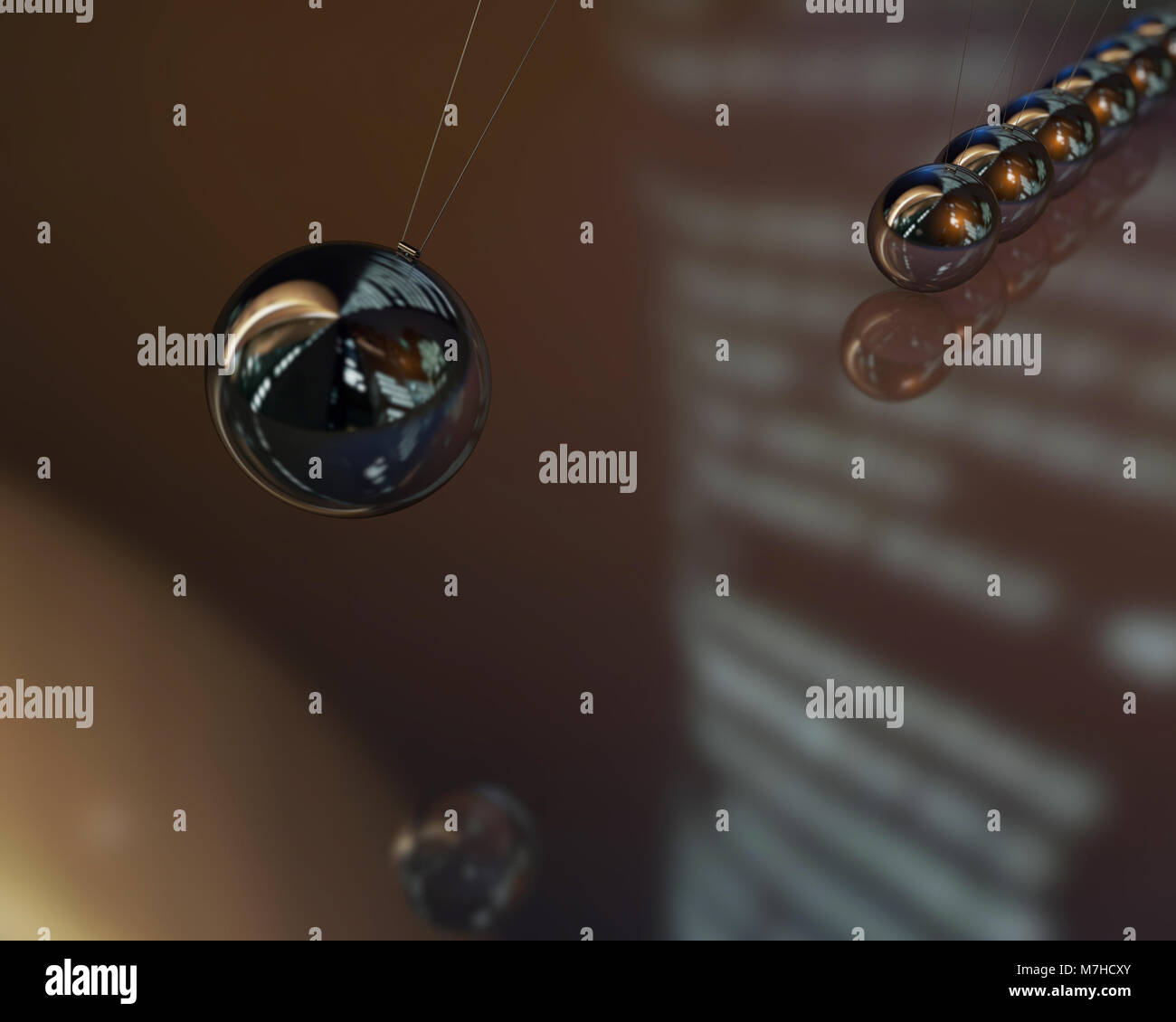 Colliding Newton balls, passing energy Stock Photo - Alamy