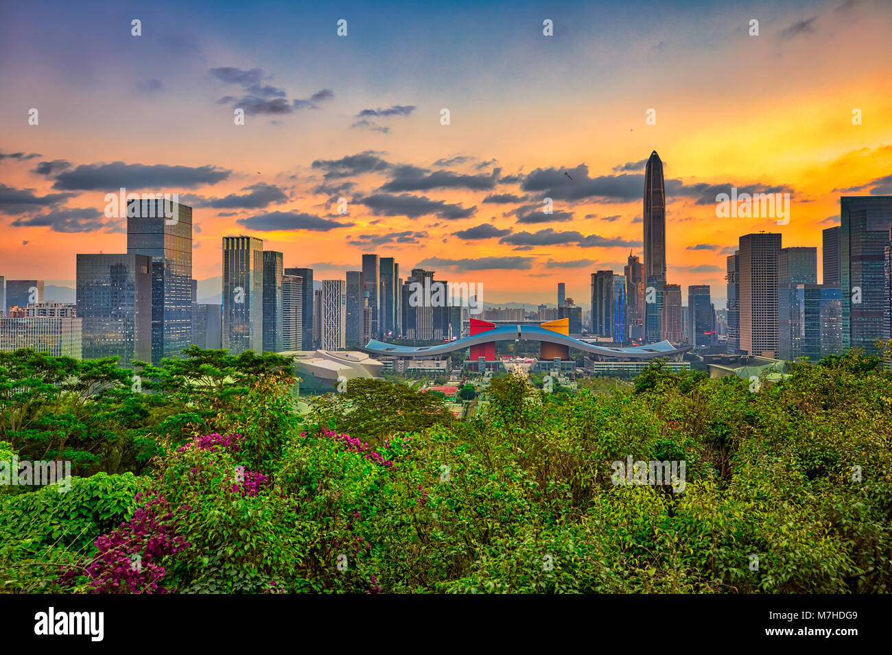 Skyline of Shenzhen city with many skyscrapers and stunning cloudscape ...