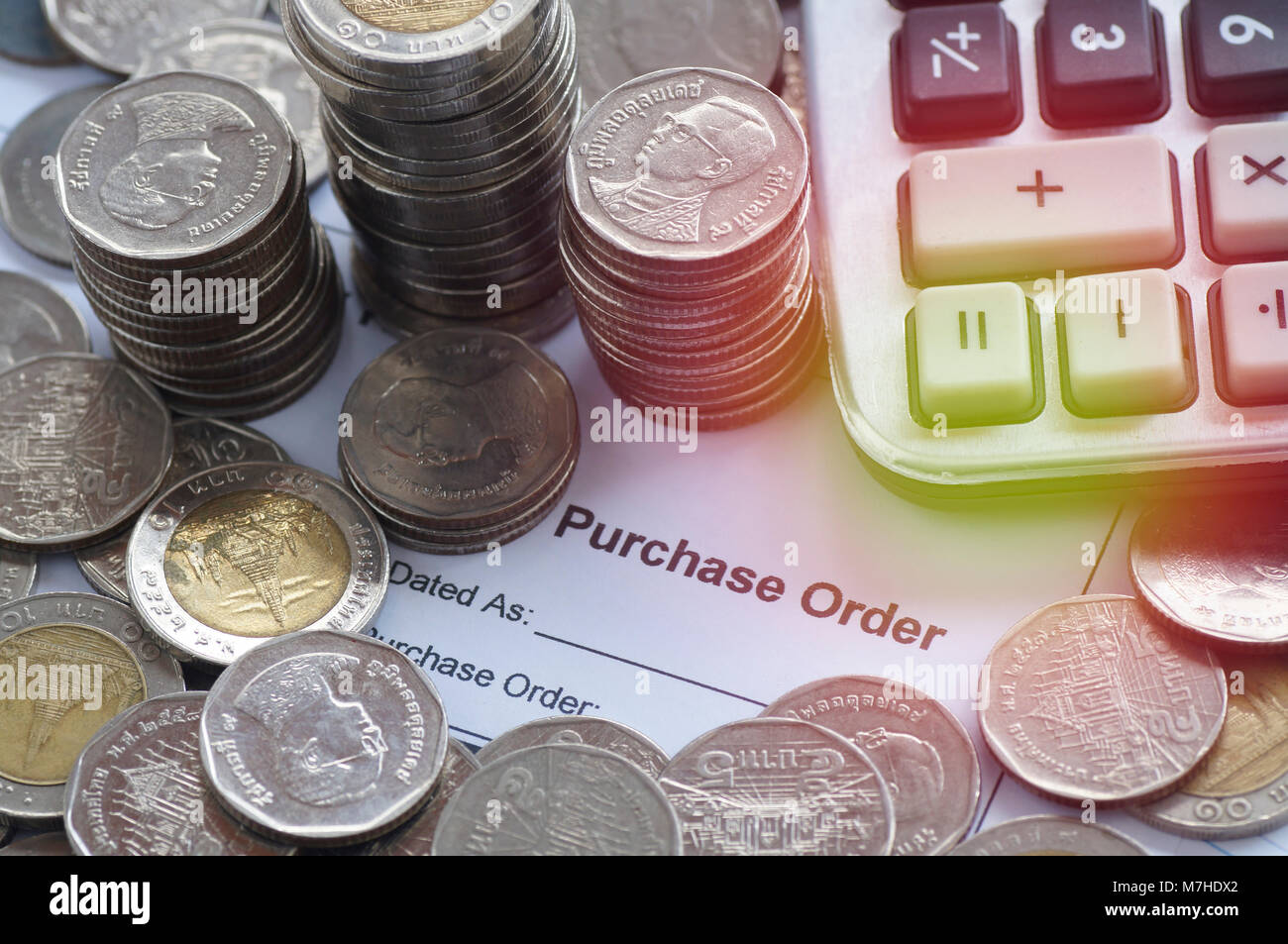 pershase order paper with coin and calculator on wood table Stock Photo ...