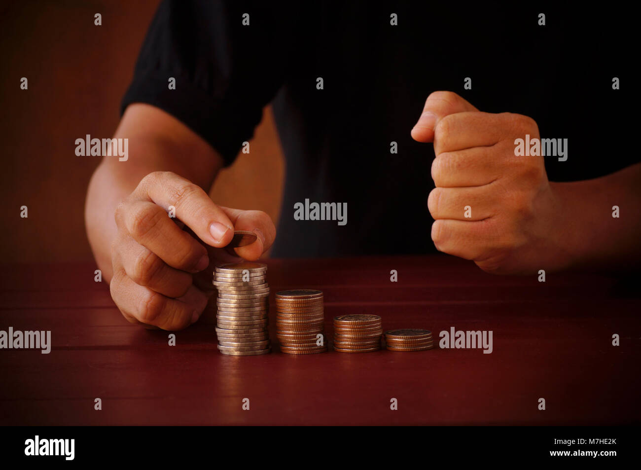 Man in pile of money hi-res stock photography and images - Alamy