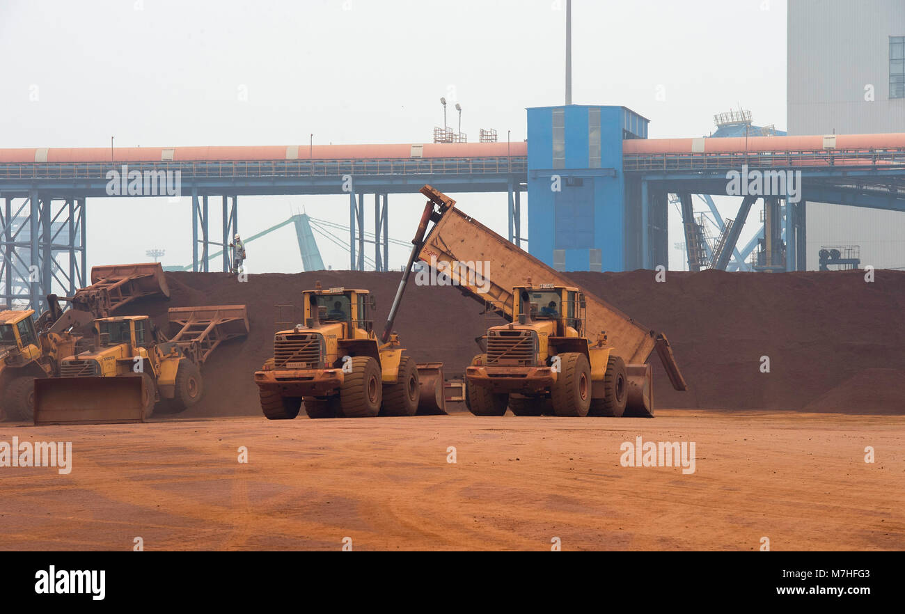 Iron Ore stockpile storage on the docks in Tianjin Port China Stock ...