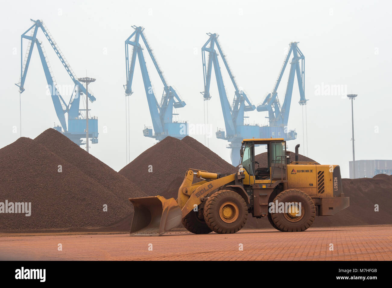 Iron Ore stockpile storage on the docks in Tianjin Port China Stock ...