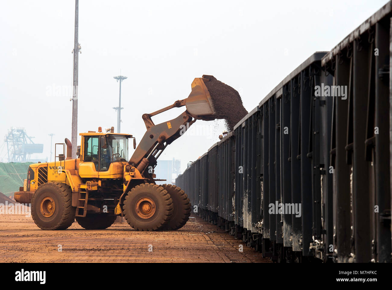 Iron Ore stockpile storage on the docks in Tianjin Port China Stock ...