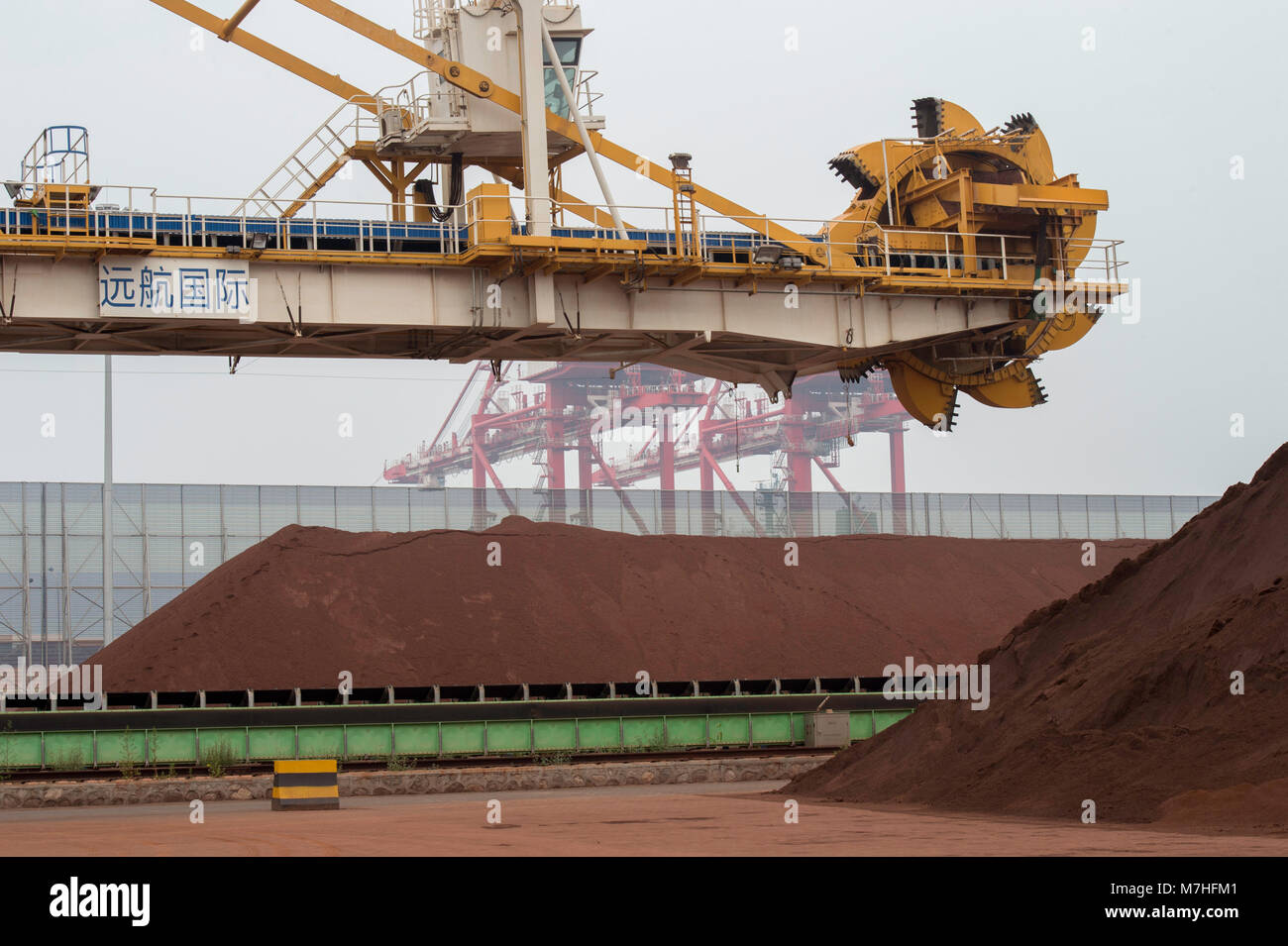 Iron Ore stockpile storage on the docks in Tianjin Port China Stock ...