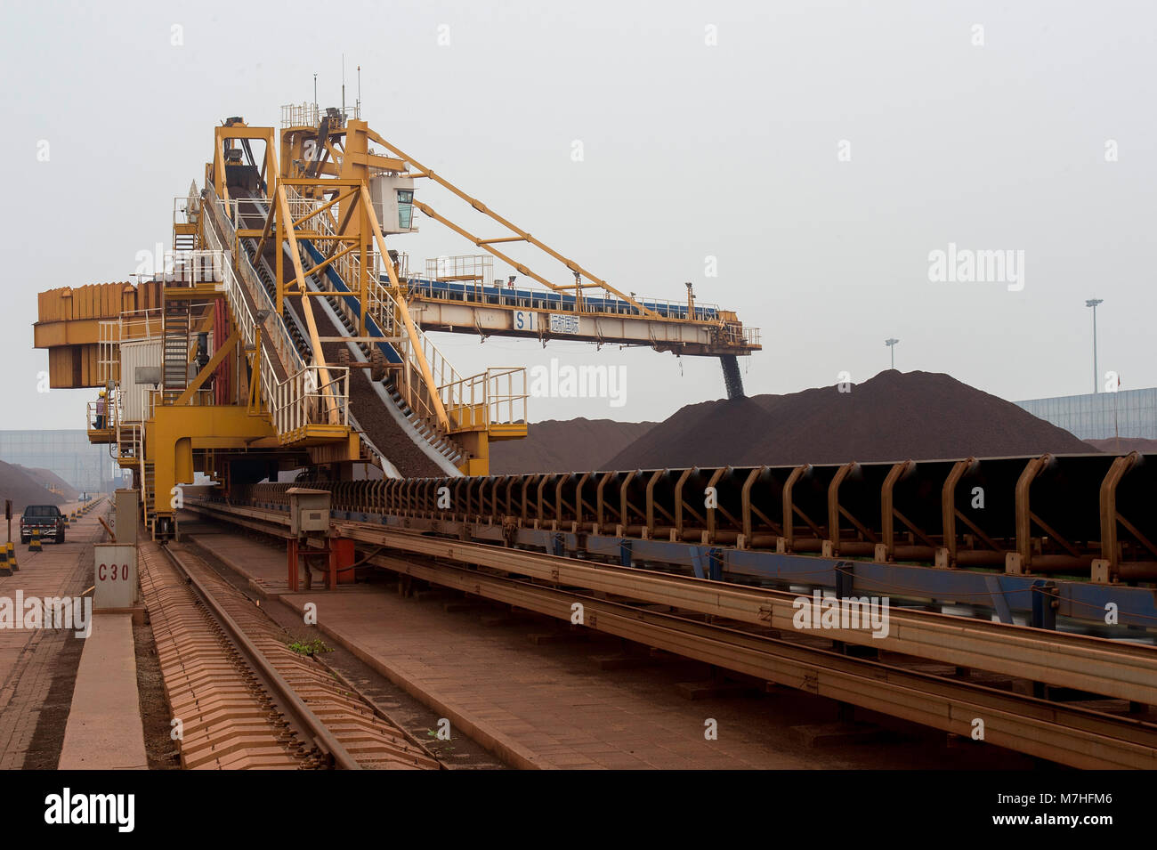 Iron Ore stockpile storage on the docks in Tianjin Port China Stock ...