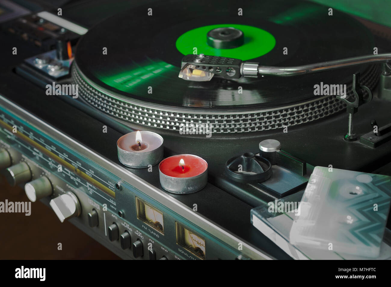 Vintage vinyl stereo player with candles on a top, indoor closeup Stock ...