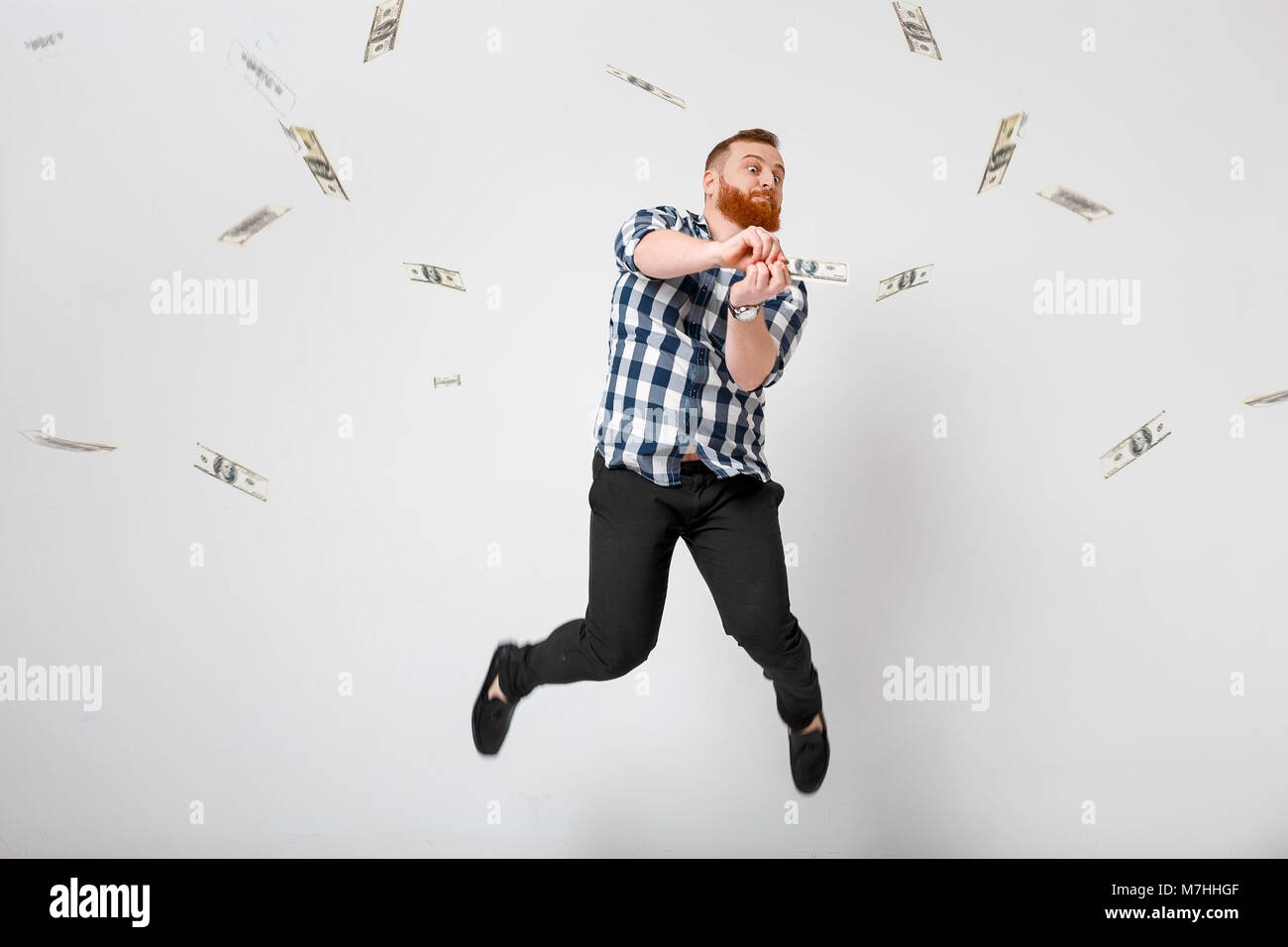 Happy man money rain hi-res stock photography and images - Alamy