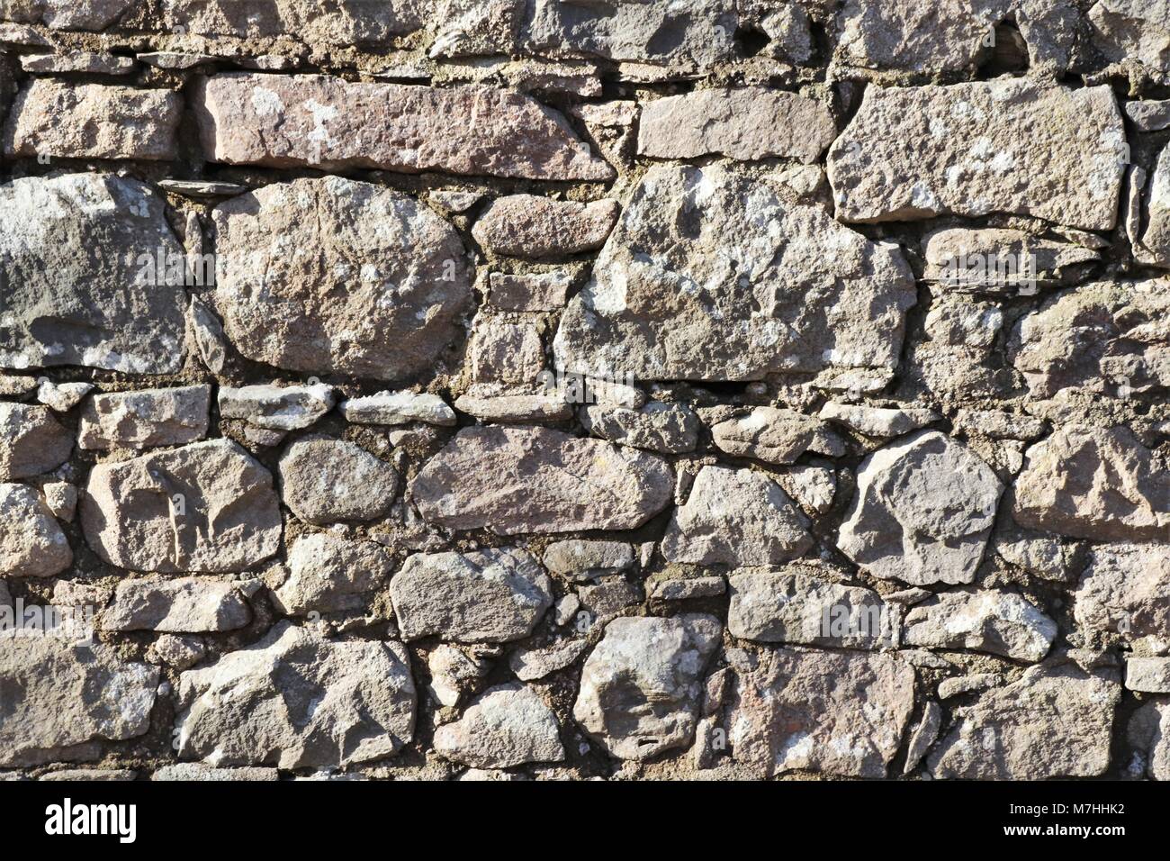 Stone wall barrier, obstacle, difficulty Stock Photo - Alamy