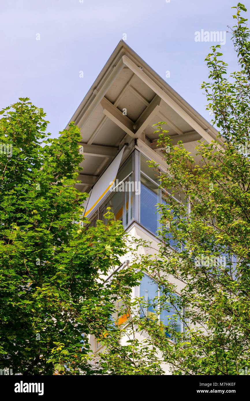 Office building with green trees Stock Photo - Alamy