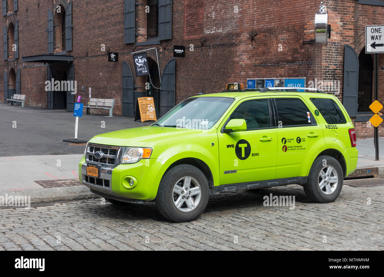 A Green Boro Taxi waiting for a fare in Dumbo, Brooklyn, NYC Stock ...