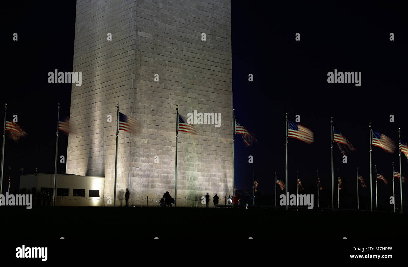 American flags at the base of the washington monument hi-res stock ...