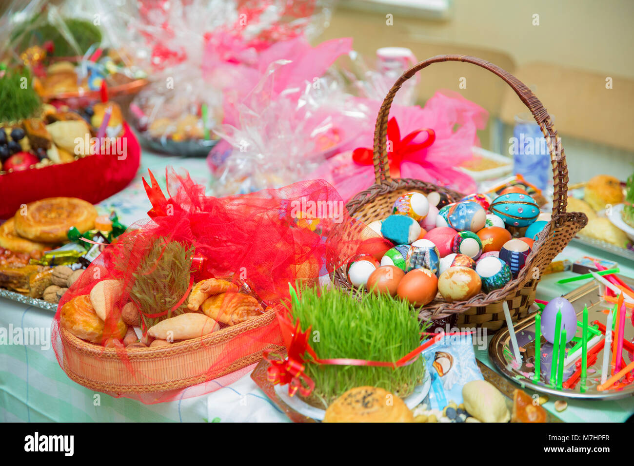 Traditional national pastry, and clay jar . Plate with national sweets ...