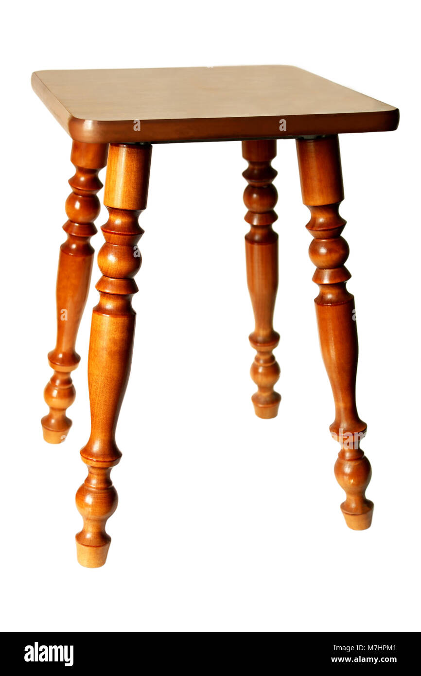 Wooden stool with carved legs isolated on white background Stock Photo ...