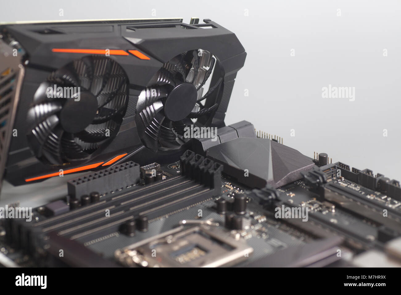 Motherboard with Graphic videocard on white background Stock Photo - Alamy