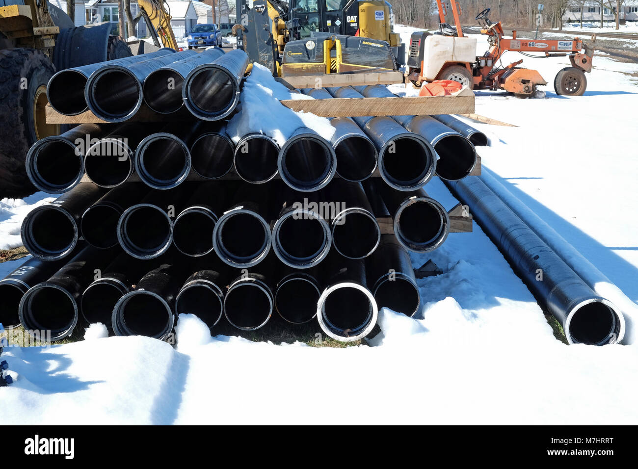 Stacks of pipe at a construction site Stock Photo - Alamy
