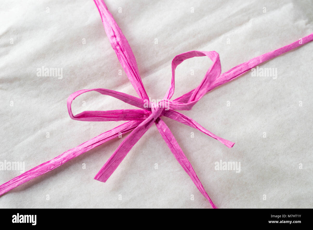 Light pink bow hi-res stock photography and images - Alamy