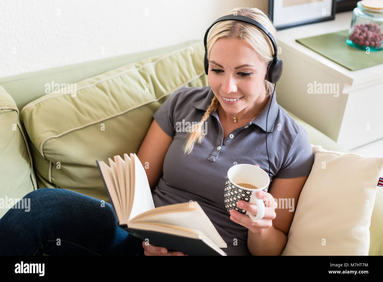Listening to a book hi-res stock photography and images - Alamy