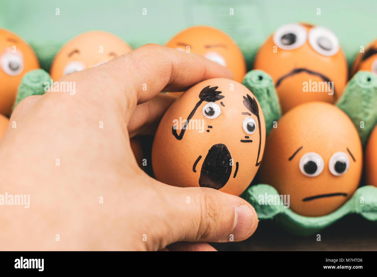 Fun concept: raw eggs with googly eyes and drawn features are in shock ...