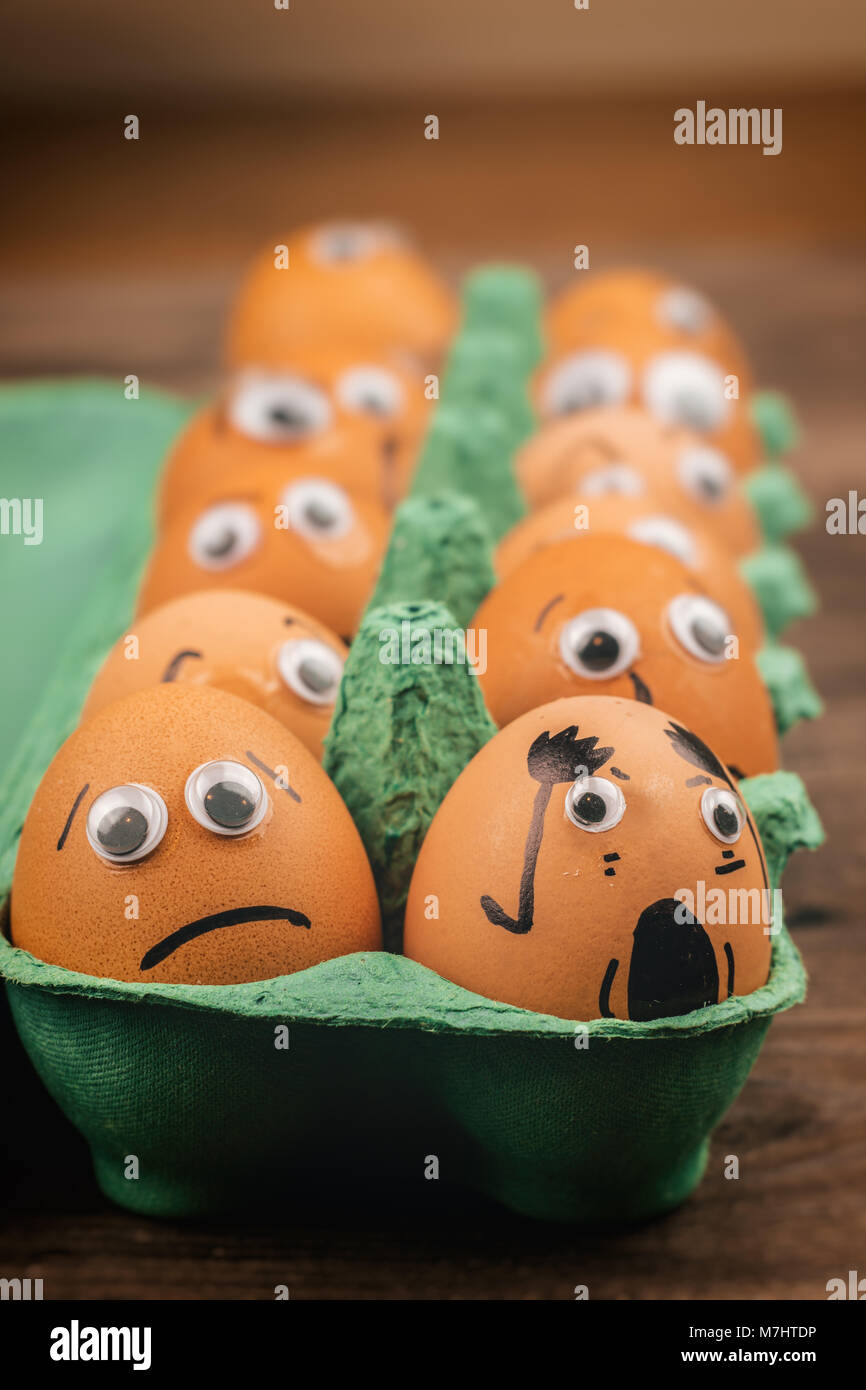 Fun concept: raw eggs with googly eyes and drawn features are in shock ...