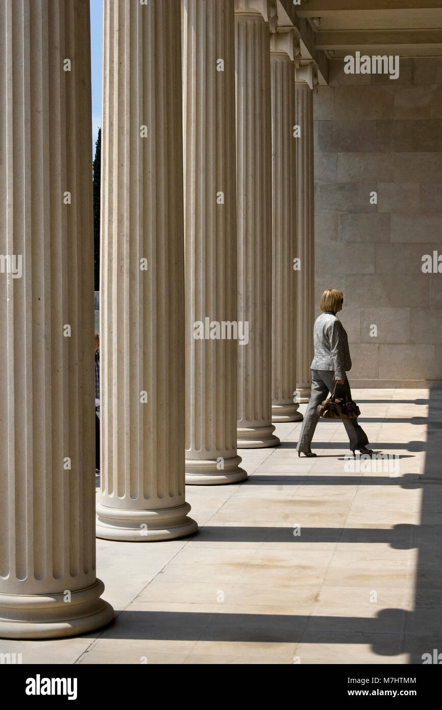 Women behind columns of entrance to Mestrovic gallery in Split; Croatia ...