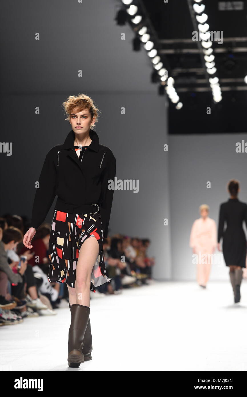 Lisbon, Portugal. 10th Mar, 2018. A model presents a creation of ...