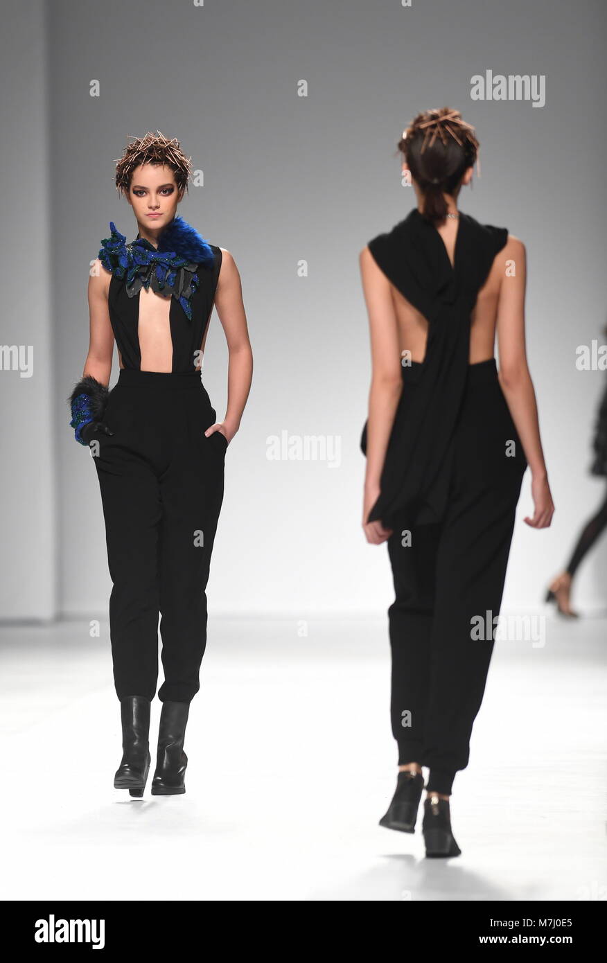 Lisbon, Portugal. 10th Mar, 2018. Models present creations of ...