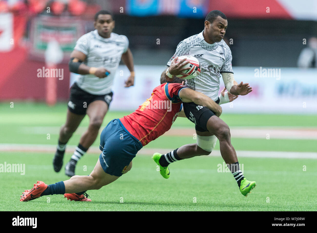 Vancouver, Canada. 10 March 2018. Pablo Fontes of Spain tackling Alasio ...