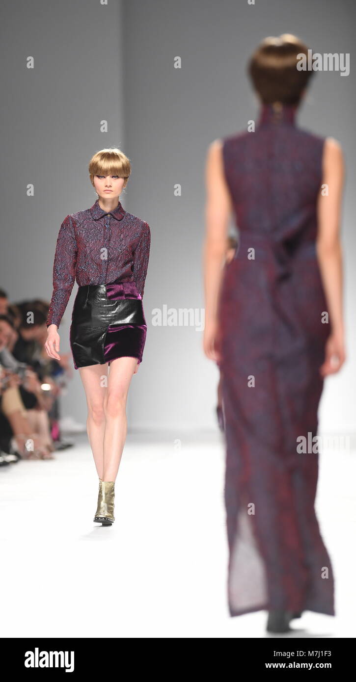 Lisbon, Portugal. 10th Mar, 2018. Models present creations of ...