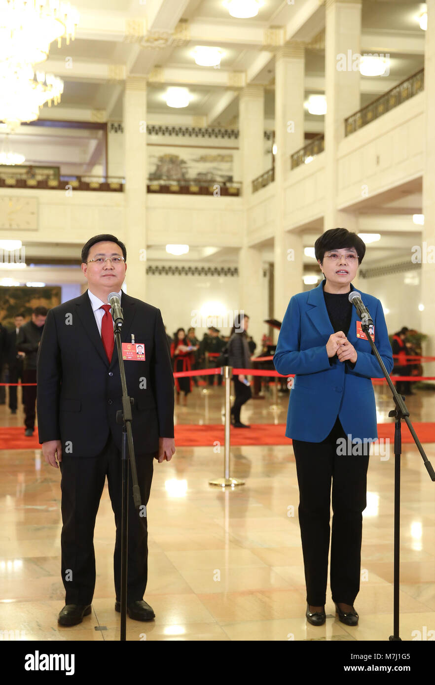 Beijing, China. 11th Mar, 2018. Yu Hongyi (R) and Guo Dajin, deputies ...