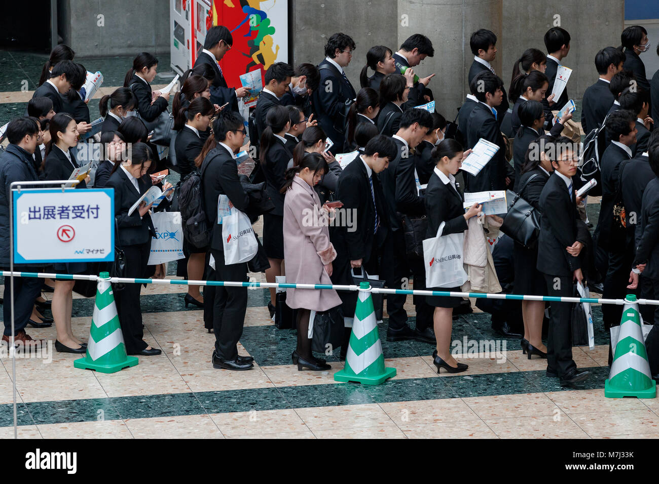 University students gather at a job fair at Tokyo Big Sight on March 11 ...