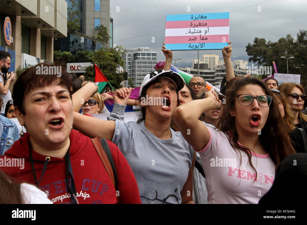 Beirut, Lebanon. 11th Mar, 2018. Lebanese women hold placards and shout ...