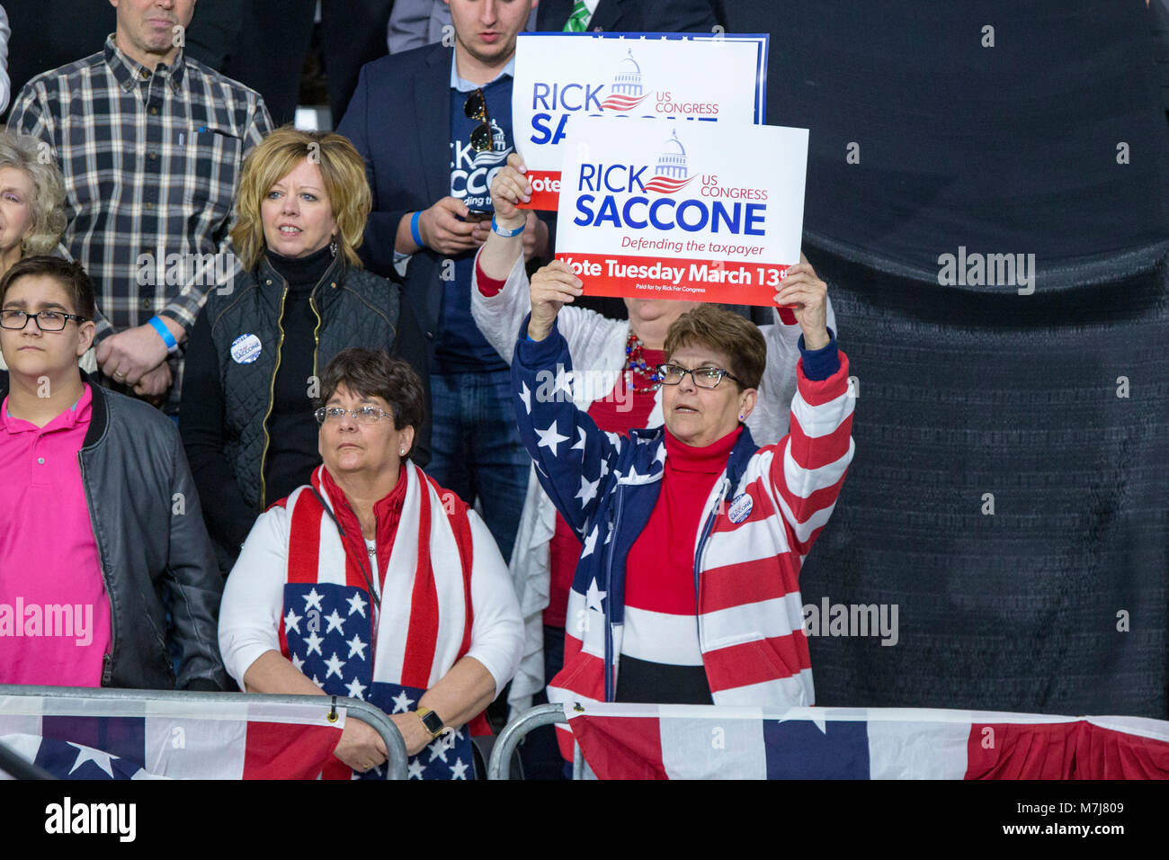 Moon Township, USA. 10th Mar, 2018. Supporters hold up Rick Saccone ...