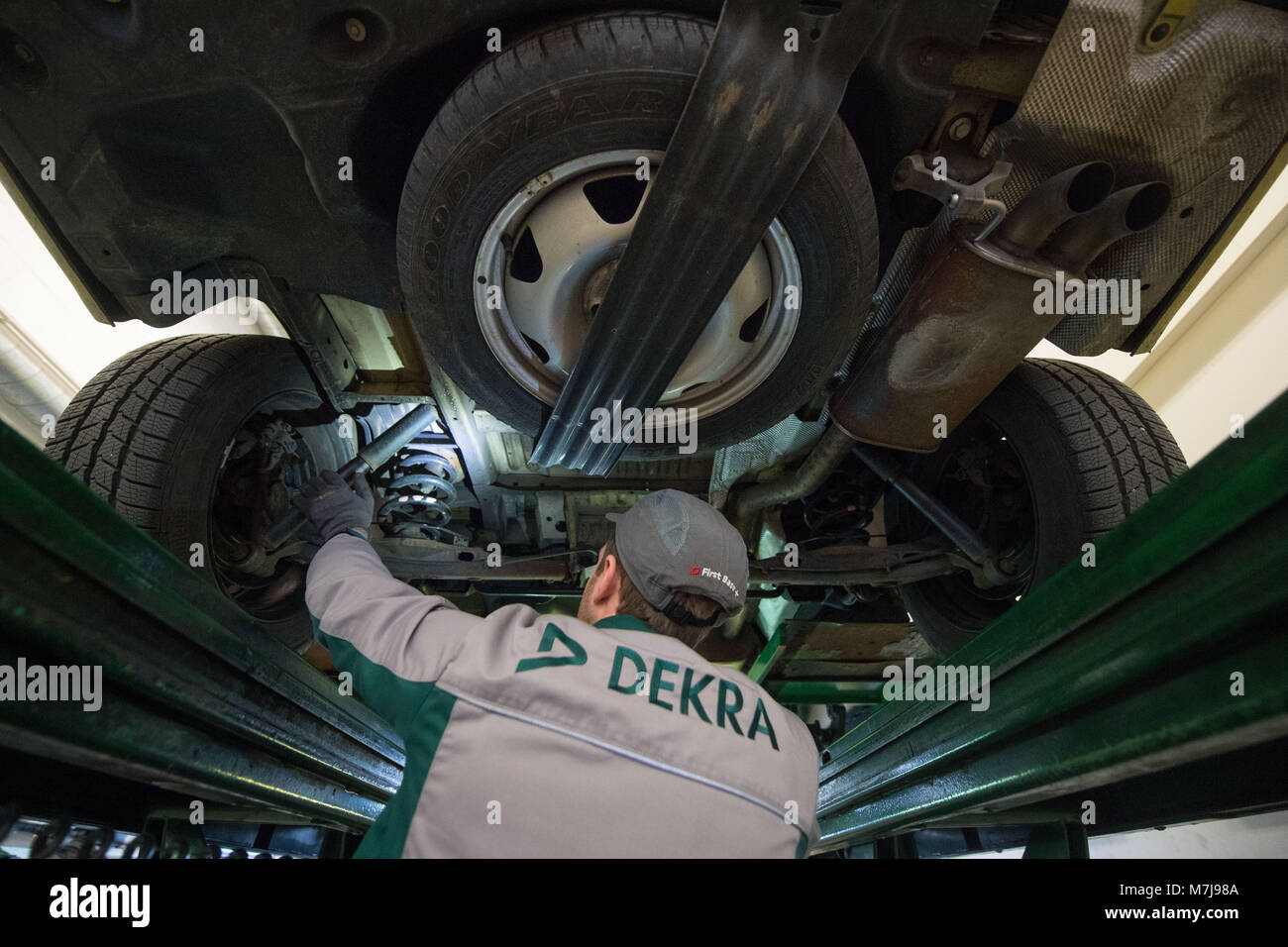 09 March 2018 Germany Stuttgart An Employee Of The Vehicle Inspection Company Dekra Checks 09-march-2018-germany-stuttgart-an-employee-of-the-vehicle-inspection-company-dekra-checks