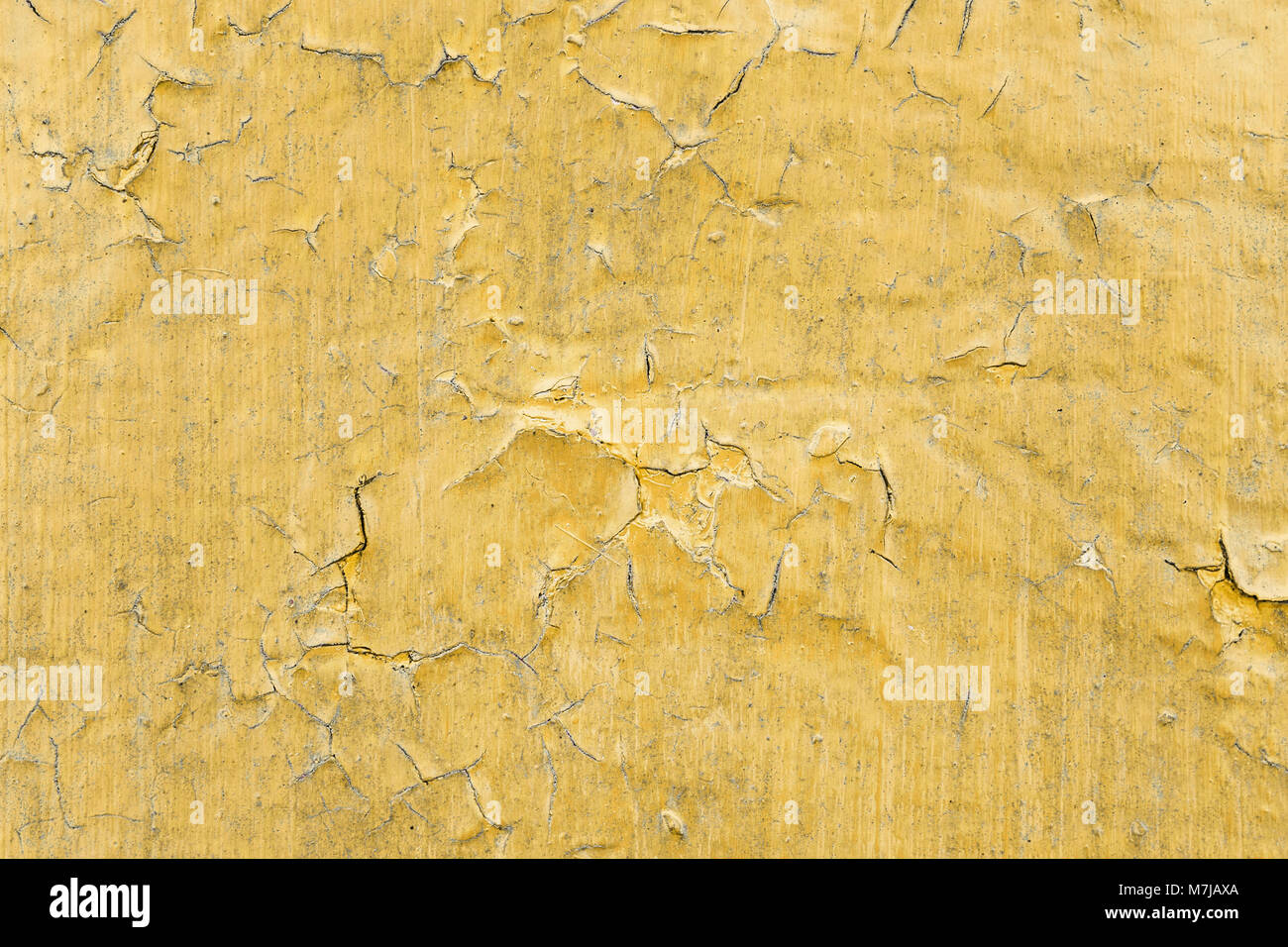 Cracked toxic yellow paint texture. Close-up of old painted red wall ...