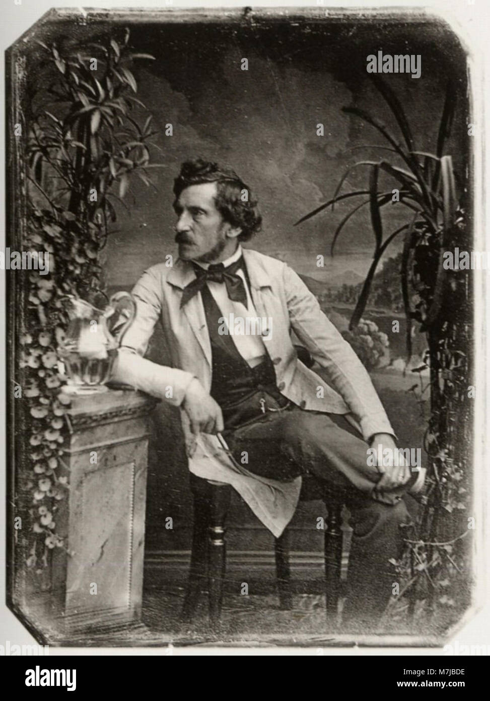 A photograph of Carl Ferdinand Stelzner in his studio, captured while ...