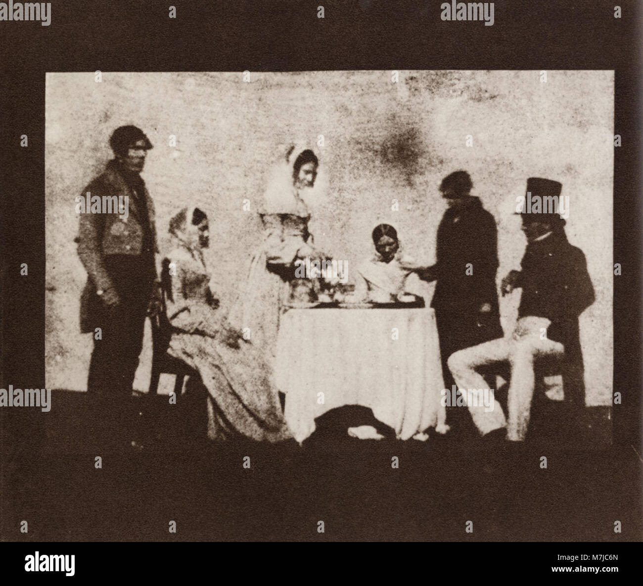 A photograph by William Henry Fox Talbot, depicting a group of people ...