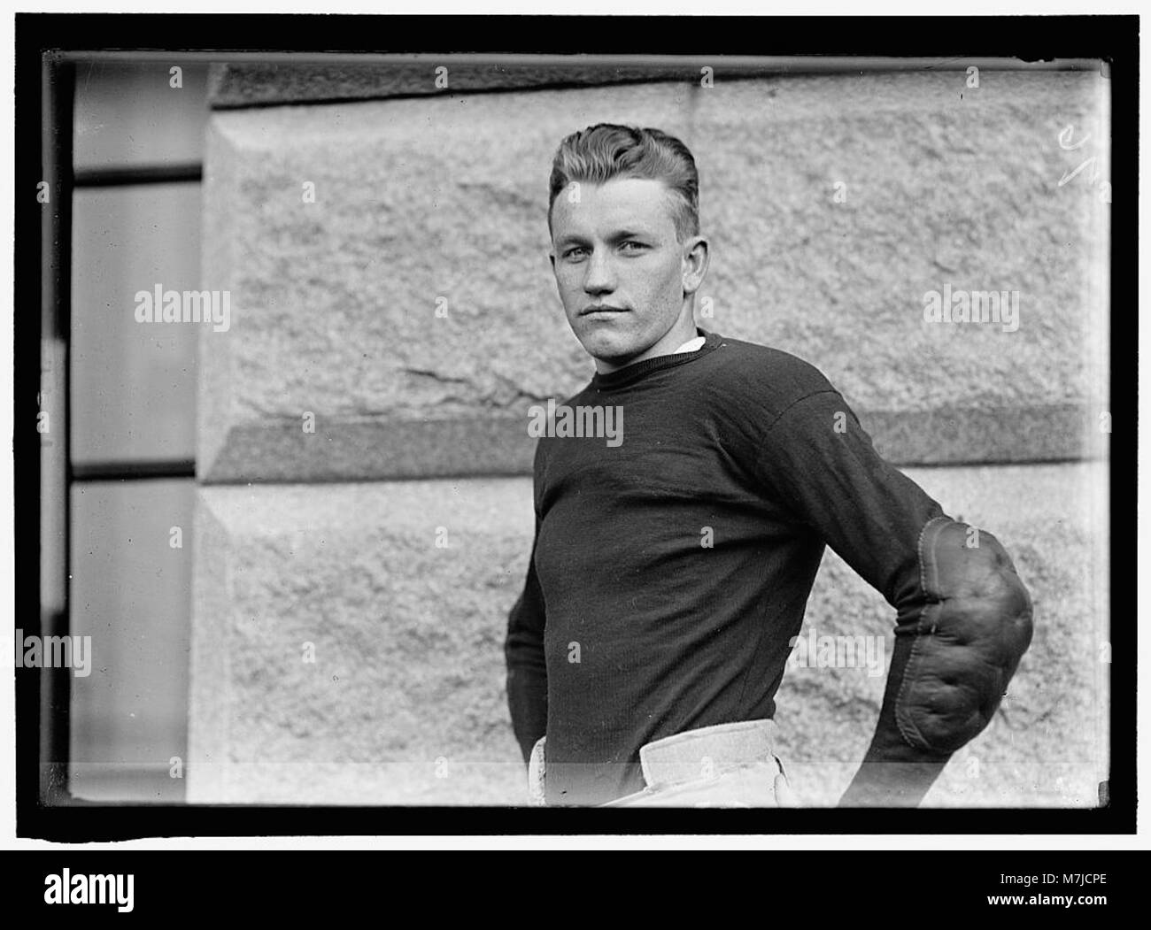 Photograph of the United States Naval Academy football team, including ...
