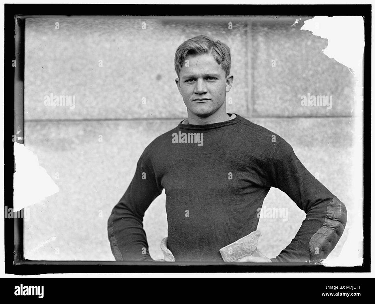 The Naval Academy football team, including players and coaches, is ...