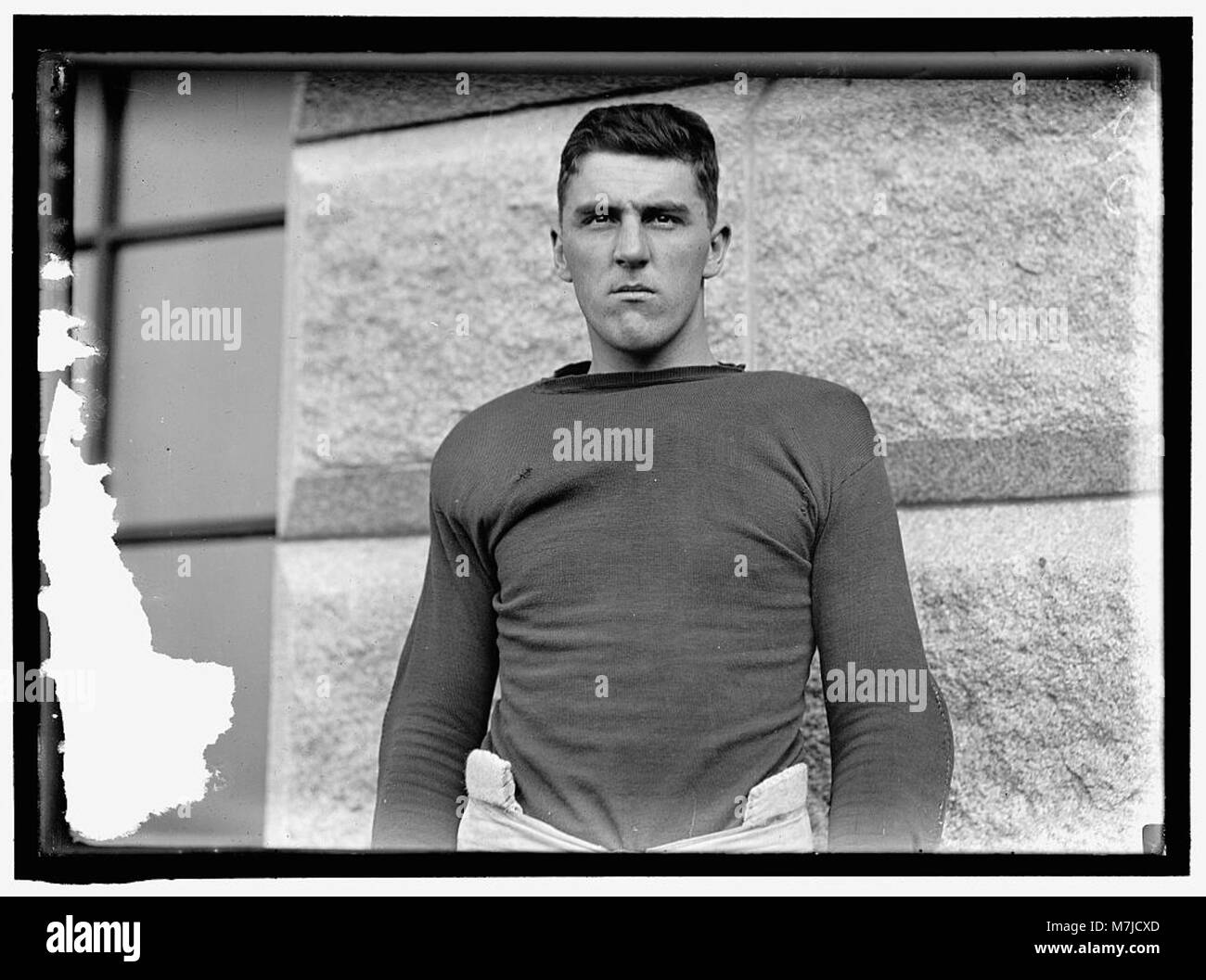 A group photograph of the Naval Academy football team, featuring the ...