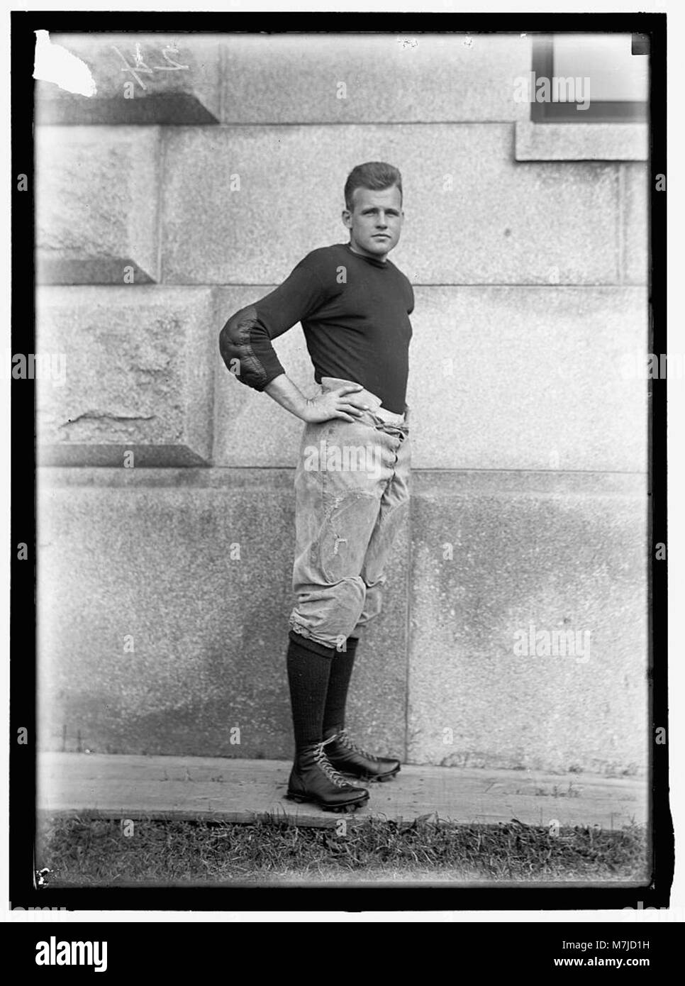 A photo of the U.S. Naval Academy football team, including players and ...