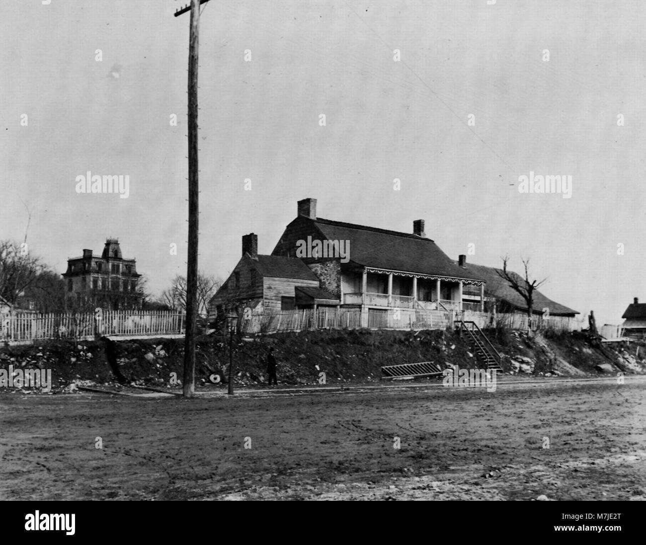 This photograph captures the Dyckman House, taken by Edward Wenzel. The ...